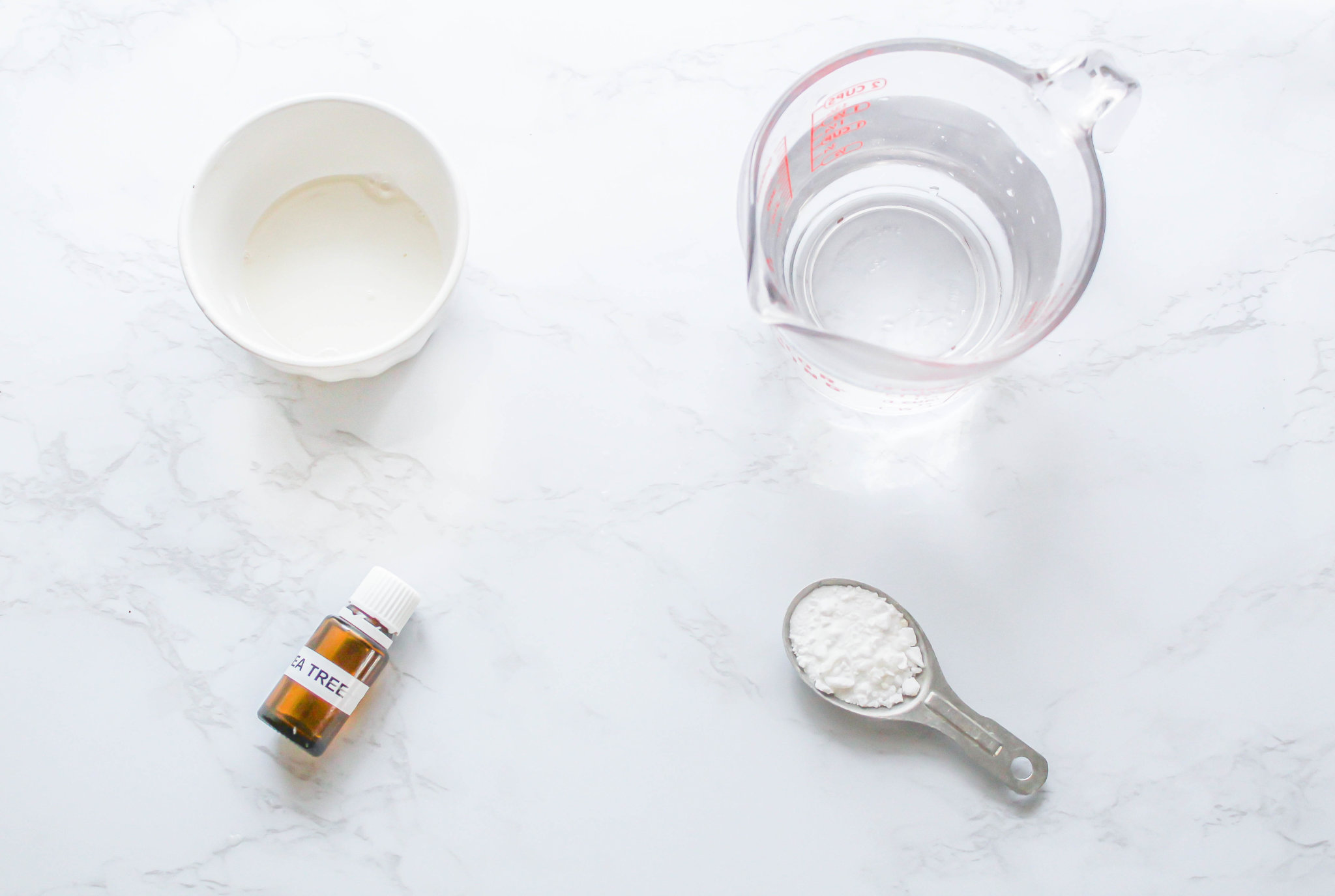 Homemade Bathroom Cleaner with Essential Oils to Sanitize